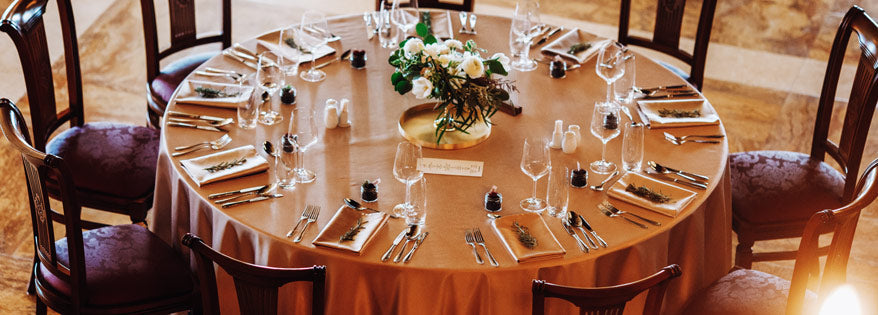 3 Table Settings with Round Tablecloths for Timeless Charm